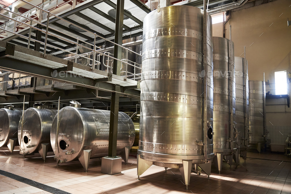Metal winemaking equipment in a modern winemaking facility Stock Photo ...
