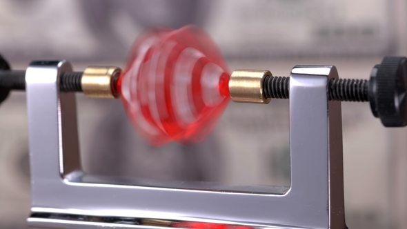 The Dice Are Spinning on the Balance Device so That the Game Is Fair ...