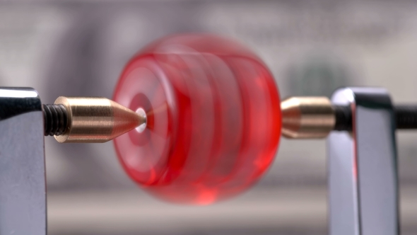 The Dice Are Spinning on the Balance Device so That the Game Is Fair ...