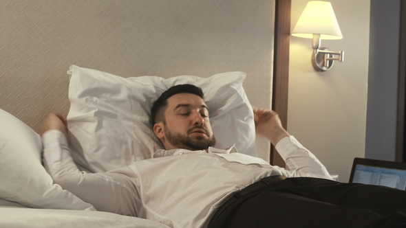 Tired Businessman Taking Rest on Bed, Stock Footage | VideoHive