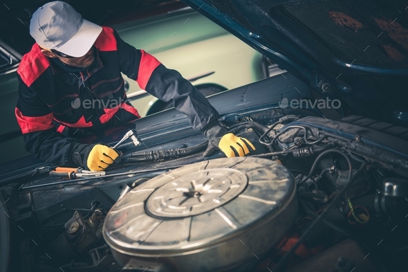 Vintage Car Mechanic Stock Photo by duallogic | PhotoDune