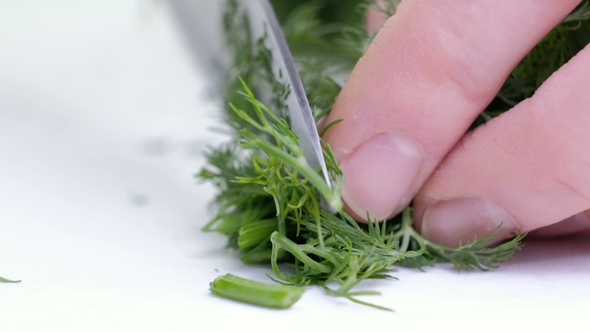 Fresh Dill on a Cutting Board, Knife and Bunches of Dill on a White ...