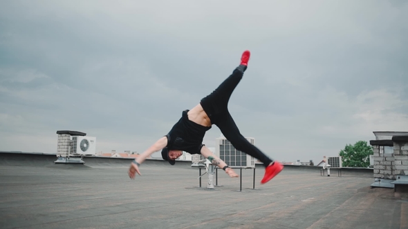 Dancer Guy Dancing Break Dance on the Roof, Stock Footage | VideoHive