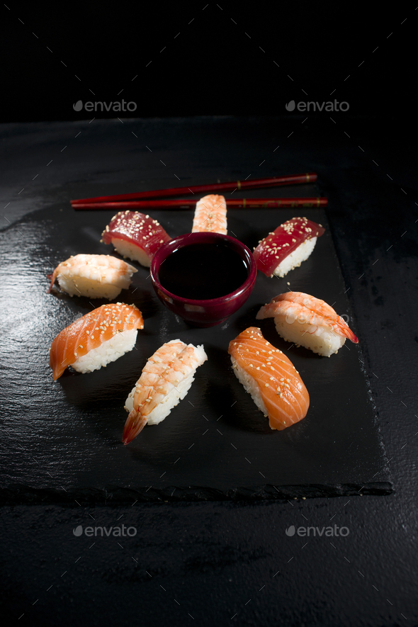 Circular sushi plate with chopsticks Stock Photo by fotografiche ...