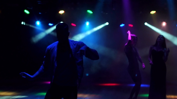 A Modern Young Guy Dances in the Dark in Nightclub, Stock Footage ...