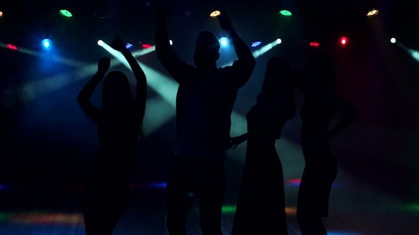 Four Friends Dancing at the Party in the Dark, Stock Footage | VideoHive