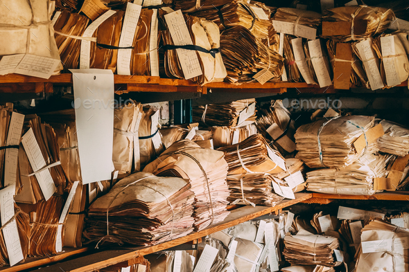 Old Paper Waste. Vintage Keeping Records In Heaps Stock Photo by Great_bru