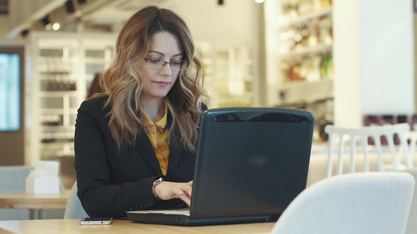 Business Woman Working Behind Laptop, Stock Footage | VideoHive