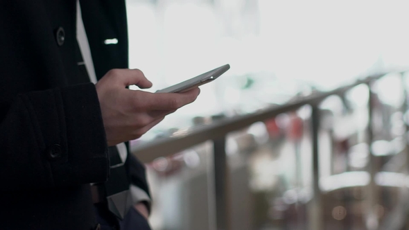 Male Hand Scrolling the Screen of Smartphone Outside, ., Stock Footage