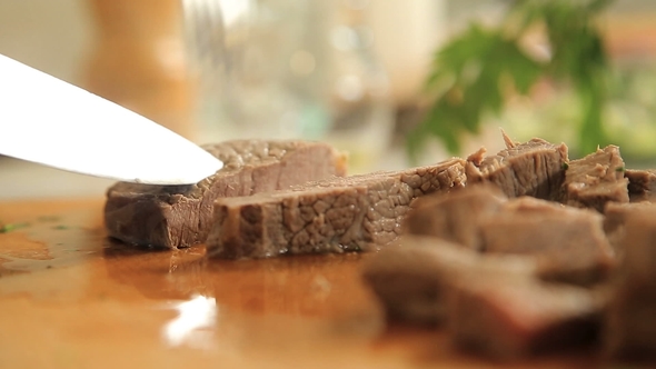Cutting Peace of Boiled Beef Meat on a Wooden Cutting Board, Stock Footage