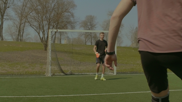 Teenager Goalkeeper Giving a Pass To Teammate, Stock Footage | VideoHive