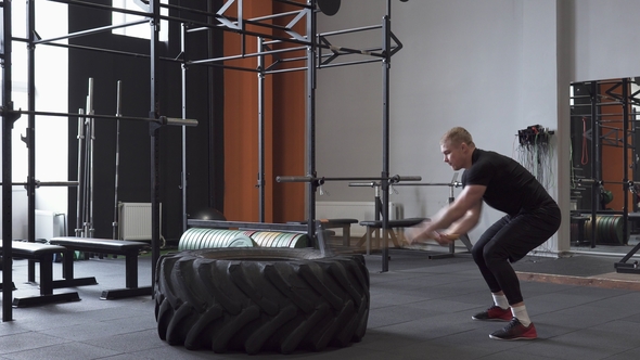 Fitness Man Doing Sledgehammer Swing Exercise in Gym, Stock Footage