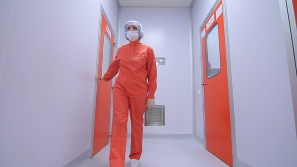 Female Scientist Going Out of Laboratory Room, Stock Footage | VideoHive