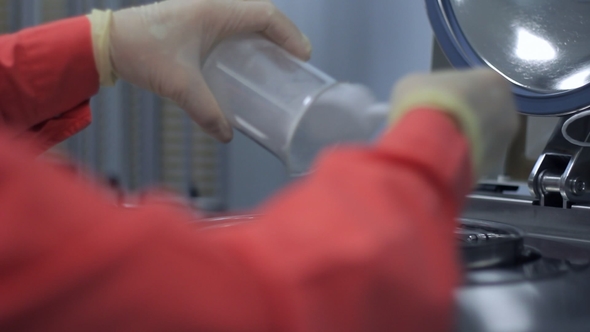 Factory Worker Loading Chemical Powder Into Medicine Production Machine ...