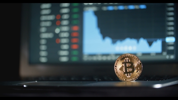 Coin Bitcoin on the Laptop and Cryptocurrency Trading Screen On ...