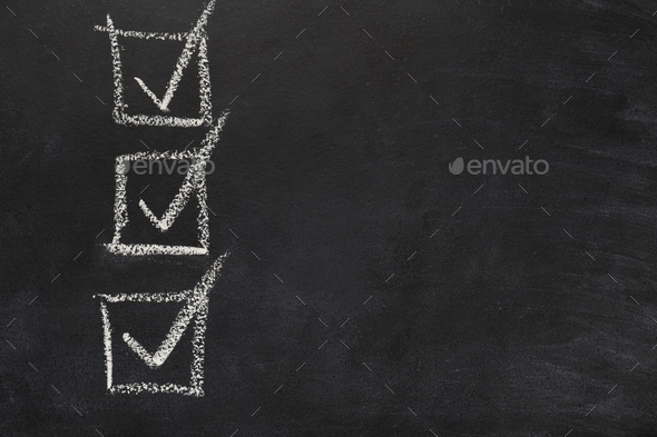 Marked checkboxses drawn with chalk on black background Stock Photo by ...