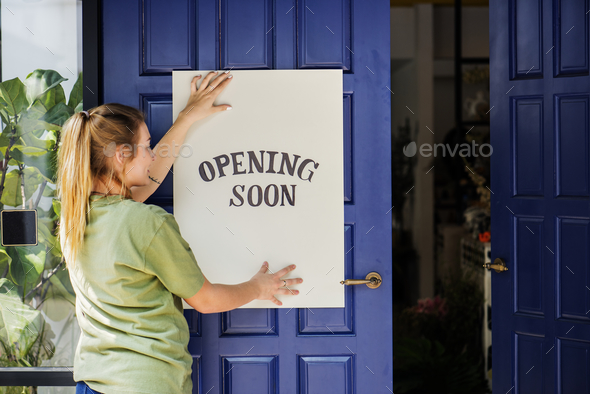 Woman putting on store opening soon sign Stock Photo by Rawpixel ...