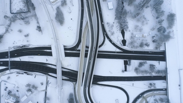 Aerial View of a Freeway Intersection Snow-covered in Winter, Stock Footage