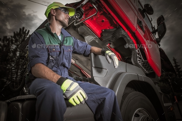Semi Truck Pro Mechanic Stock Photo by duallogic | PhotoDune
