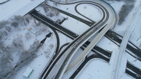 Aerial View of a Freeway Intersection Snow-covered in Winter, Stock Footage