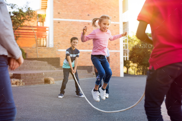 Children playing with skipping rope Stock Photo by Rido81 | PhotoDune