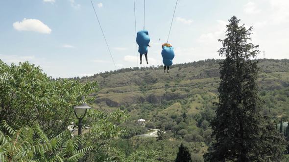 Two People Taking Zipline Ride at Tbilisi in Georgia, Stock Footage