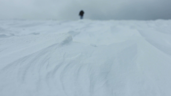 Man Goes Through the Snow at Mountain, Stock Footage | VideoHive