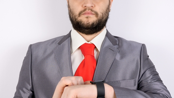 Bearded Businessman Checking His Smartwatch, Stock Footage | VideoHive