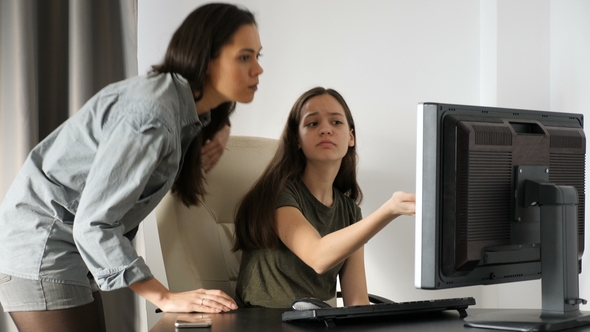 Teenage Girl Does Not Understand Something on the Computer, Stock Footage