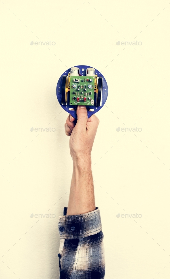 Hand holding motherboard circuit hardware part Stock Photo by Rawpixel