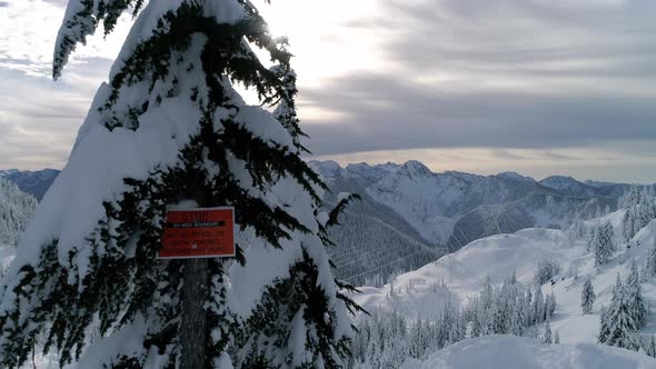 Backcountry Ski And Snowboard Caution Warning Sign Aerial, Stock Footage