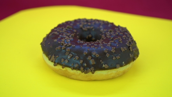 Delicious Sweet Donut Rotating on a Plate. Top View. Bright and ...