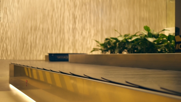 Baggage Claim at the Airport. Luggage Travels on a Conveyor Belt ...