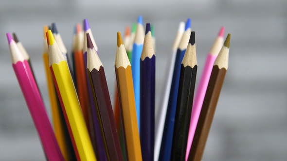 Color Pencils Rotating on a Grey Background, Stock Footage | VideoHive