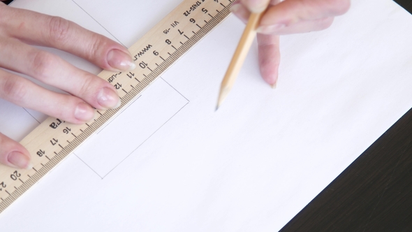 Woman's Hands Make a Drawing with a Ruler and Pencil, Stock Footage