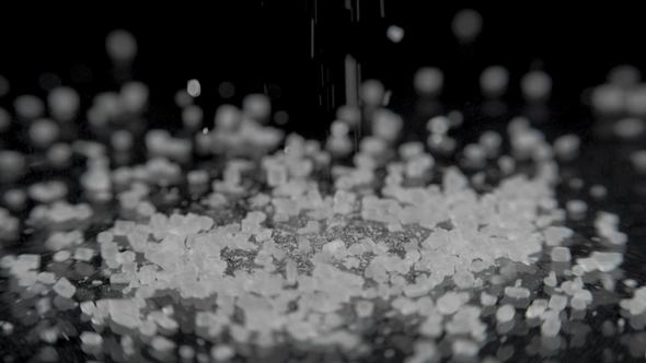 Sugar Falling on the Table in Dark Studio, Stock Footage | VideoHive