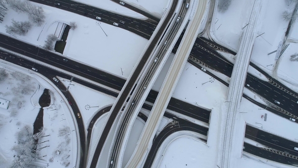 Aerial View of a Freeway Intersection Snow-covered in Winter, Stock Footage