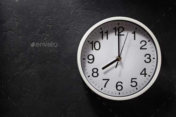 wall clock at black background Stock Photo by seregam | PhotoDune