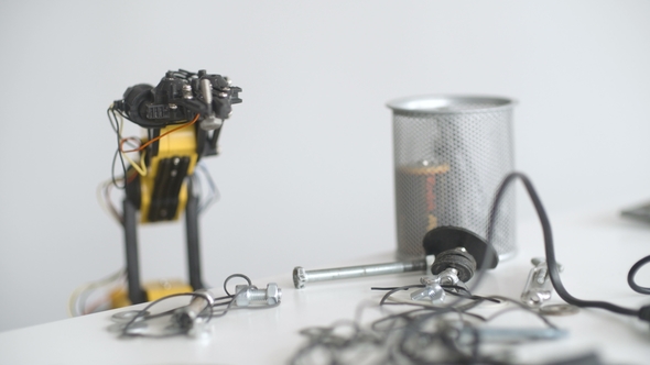 Robot Arm Works with Screw And Metal Details. Experiment with ...