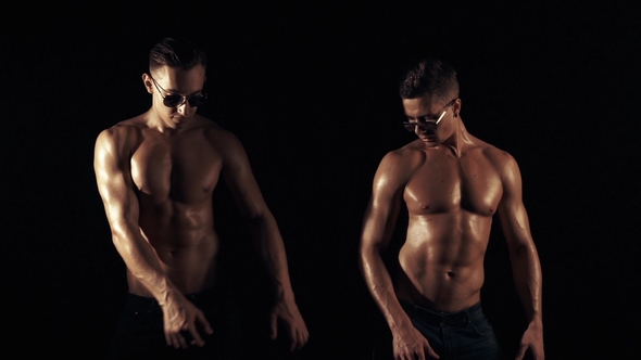 Two Funny Guys on a Black Background, Stock Footage | VideoHive