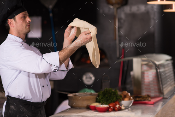 chef throwing up pizza dough Stock Photo by dotshock | PhotoDune
