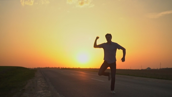 The Man Is Happy at Sunset, Stock Footage | VideoHive