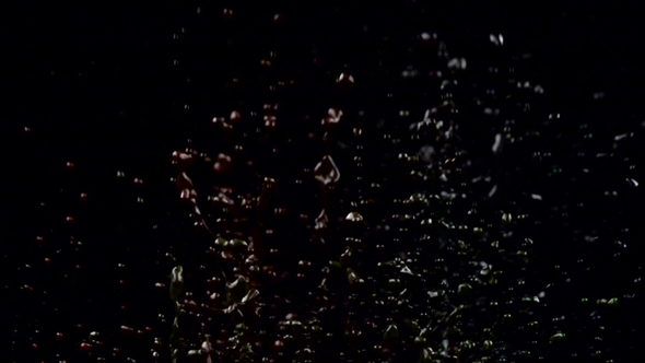 Dark Red Spray Large Droplets of Water Fly Up. Black Background., Stock ...