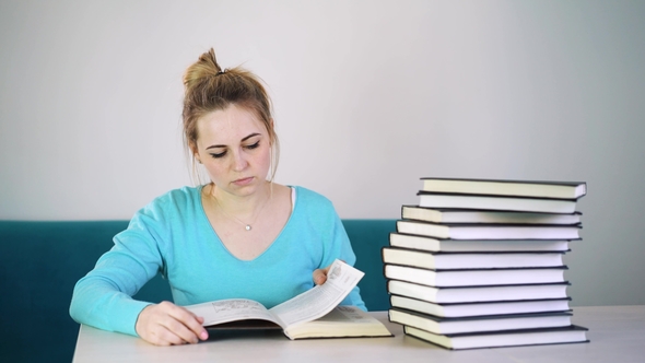 Girl in the Library Chose to Push the Book aside and Picks up the Phone ...