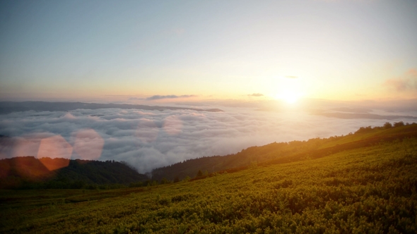 Brilliant Summit Dawn above Flowing Cloud Waves, Stock Footage | VideoHive