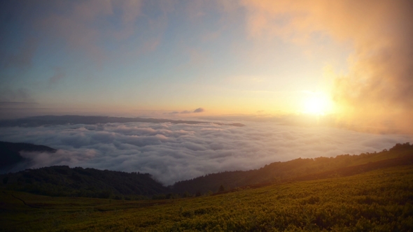 Brilliant Summit Dawn Above Flowing Cloud Waves, Red Sun Disk, Stock ...