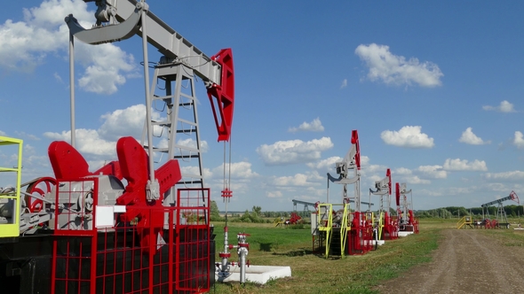 Working Oil Pumps in Row at Sunny Day,, Stock Footage | VideoHive