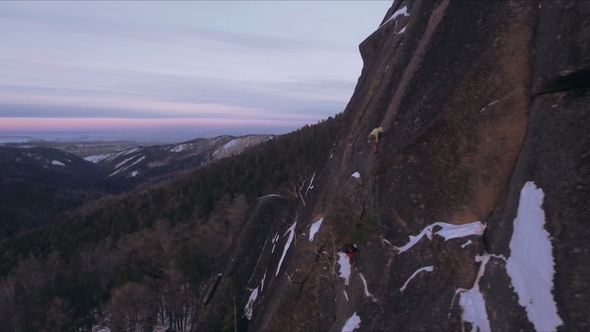 Aerial View of a Rock Climber Climbing a Steep Cliffs during a Sunny ...