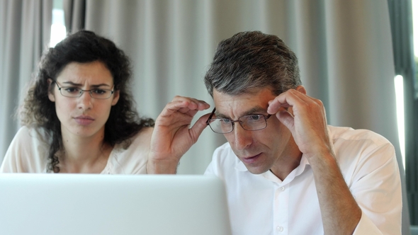 Colleagues Look Disappointed at the Computer, Stock Footage | VideoHive