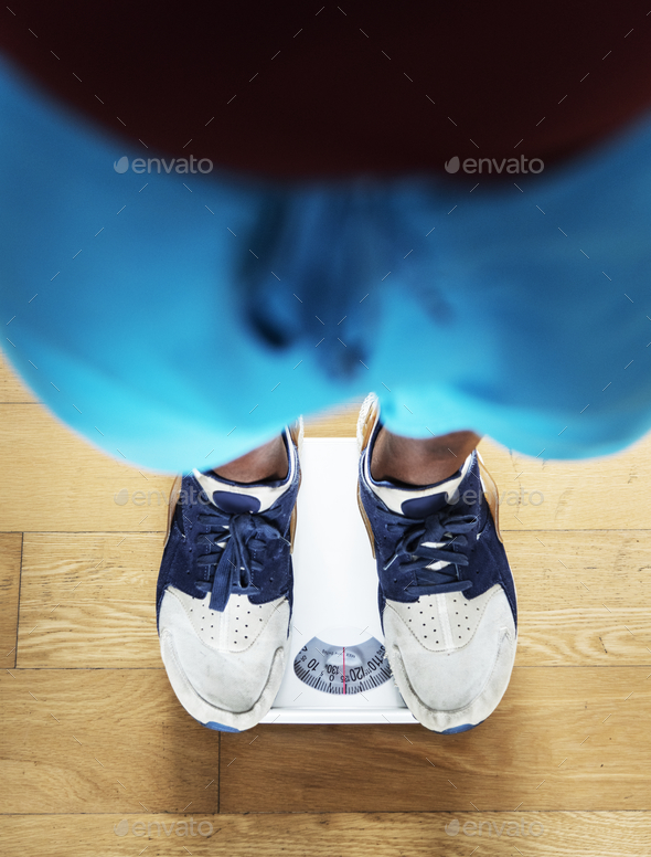 Man standing on a scale Stock Photo by Rawpixel | PhotoDune